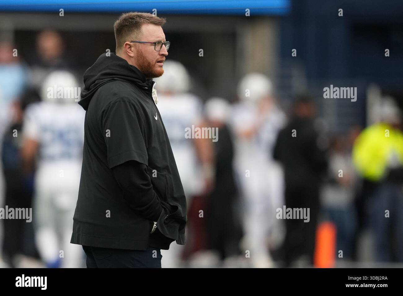 Seattle Seahawks special teams coordinator Jay Harbaugh watches warmups ...