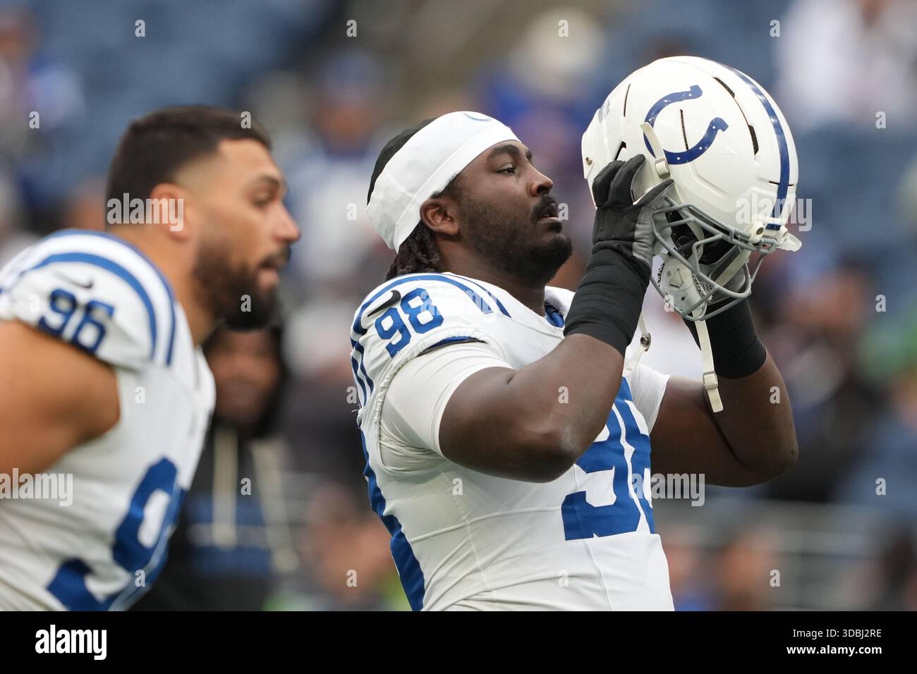 Indianapolis Colts defensive tackle Eric Johnson II (98) warms up ...
