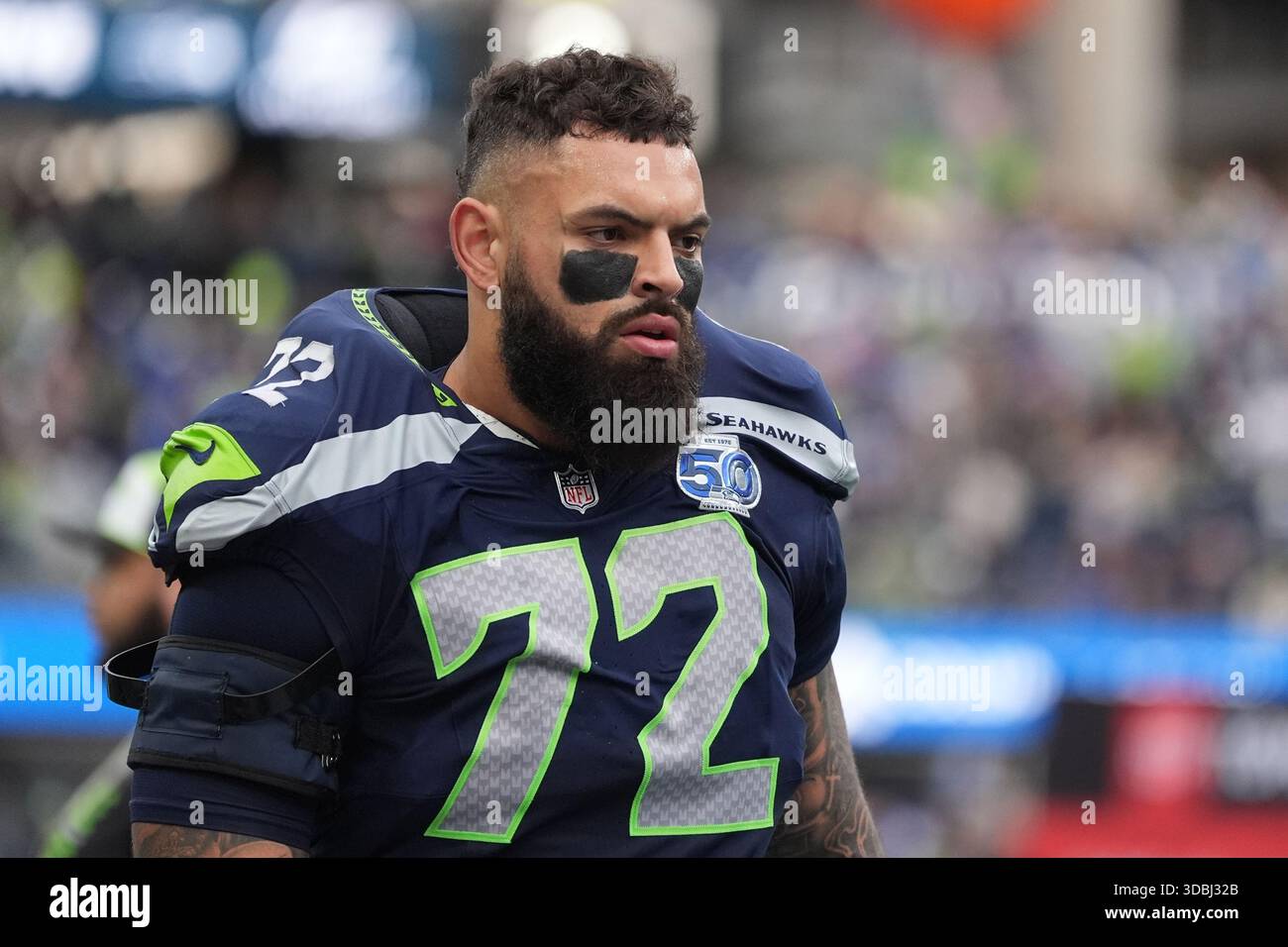 Seattle Seahawks offensive tackle Abraham Lucas (72) walks on the field ...