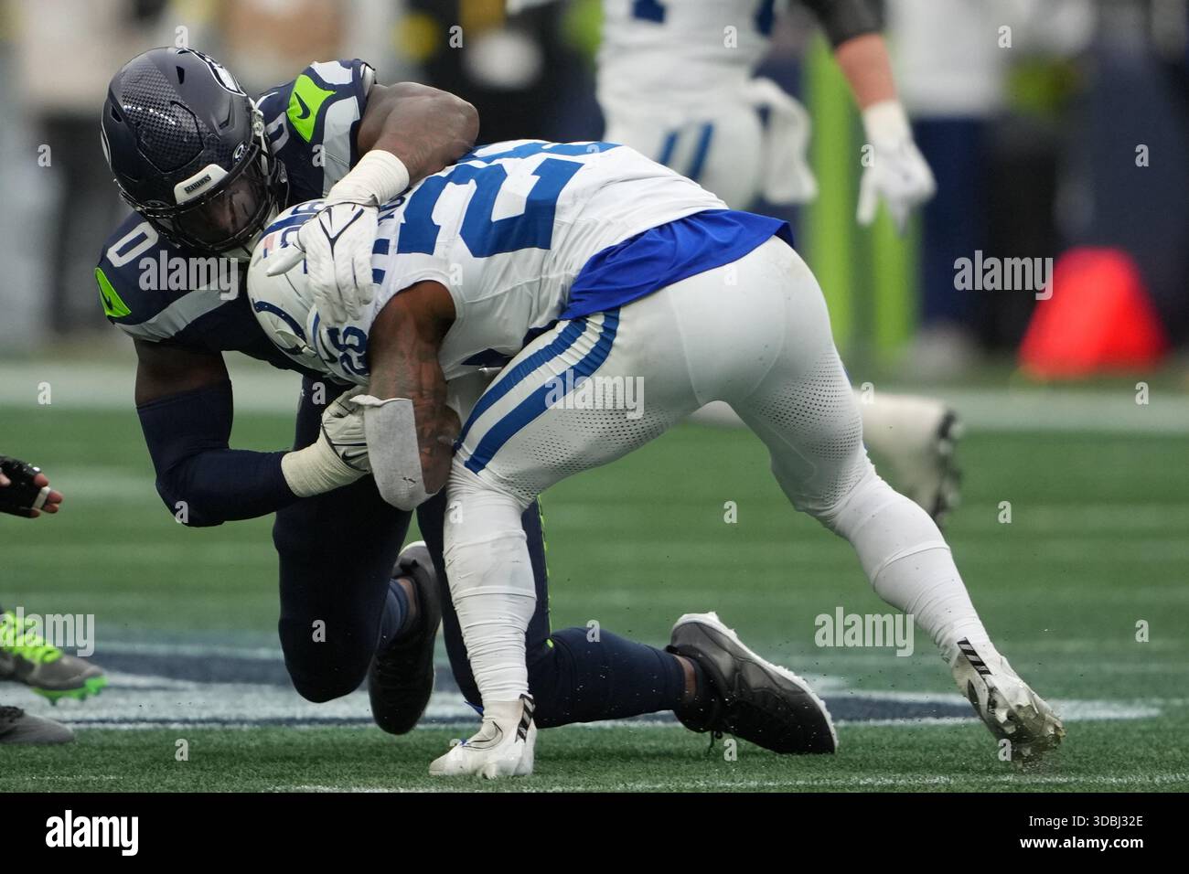 Seattle Seahawks defensive end DeMarcus Lawrence (0) tackles ...