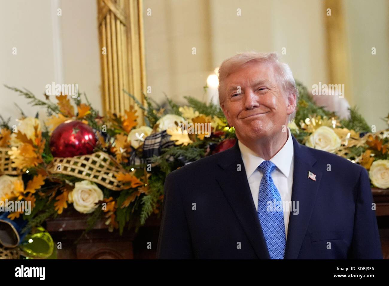 President Donald Trump smiles during a Hanukkah reception in the East ...