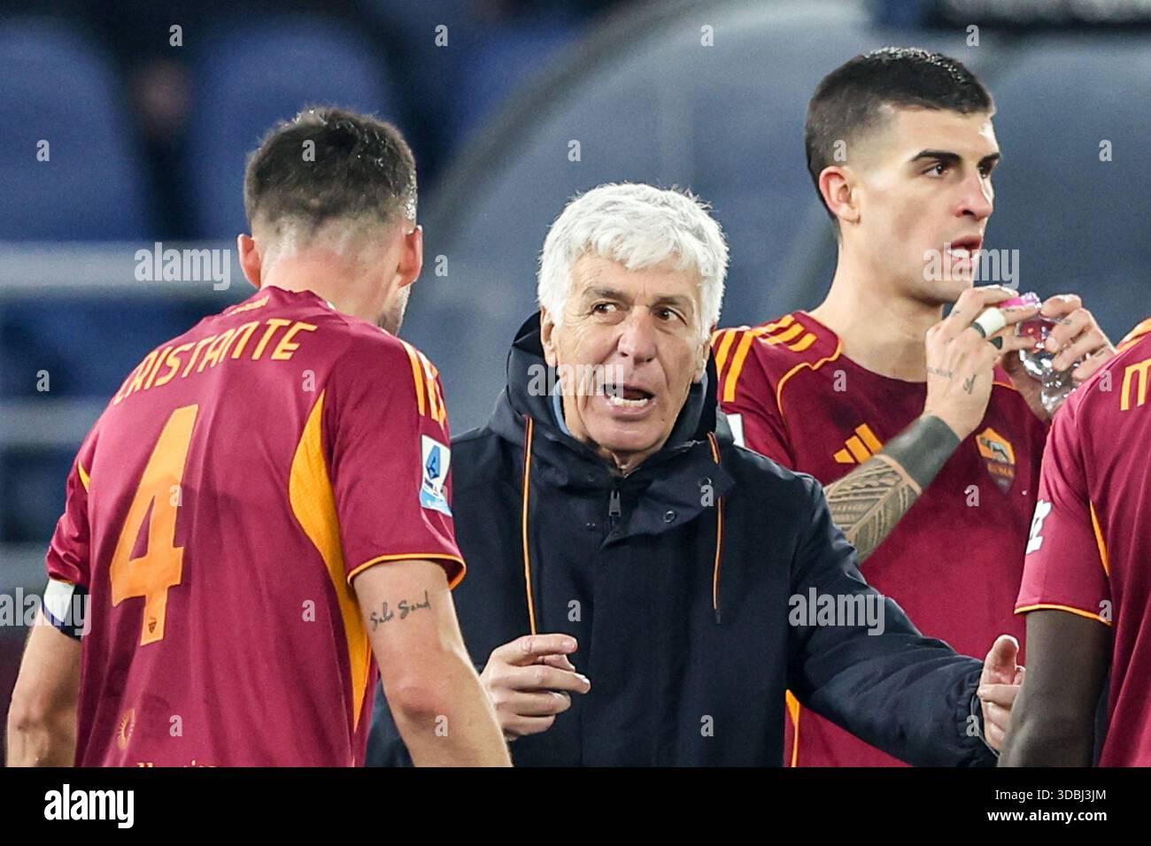 Bryan Cristante of AS Roma (L), Coach Gian Piero Gasperini of AS Roma ...