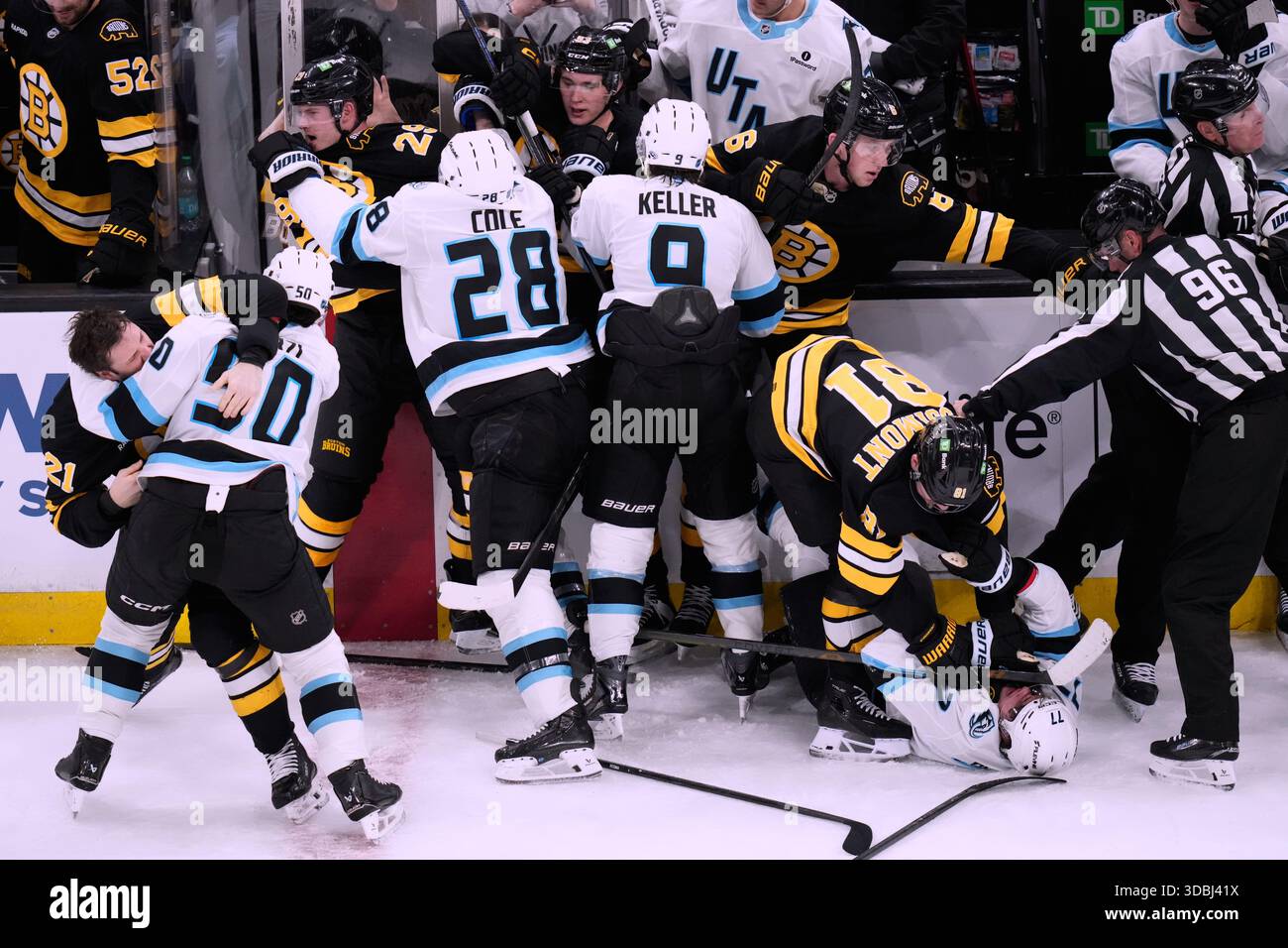 Boston Bruins fight the Utah Mammoth late in the third period of an NHL ...