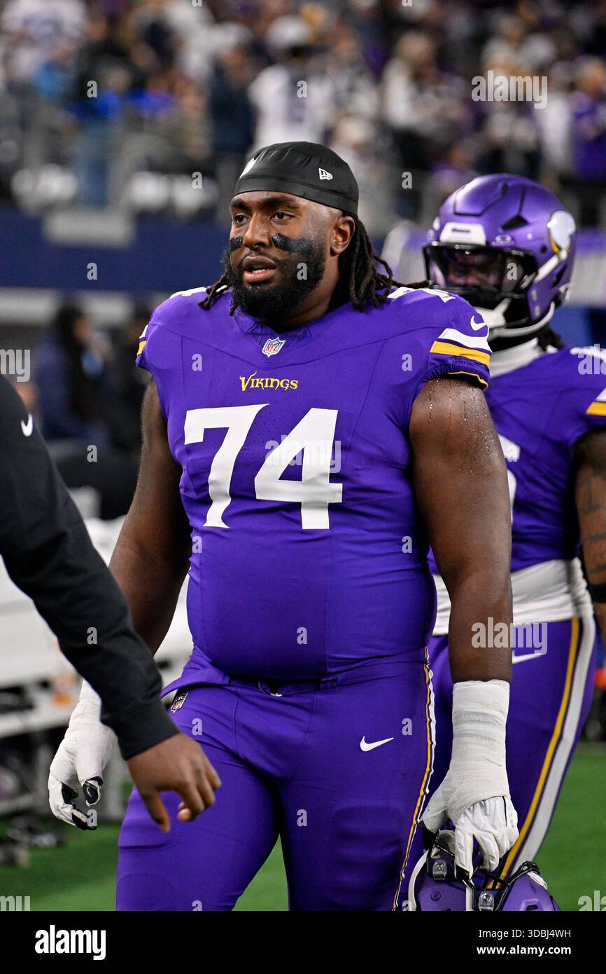 Minnesota Vikings guard Donovan Jackson (74) walks on the field before ...