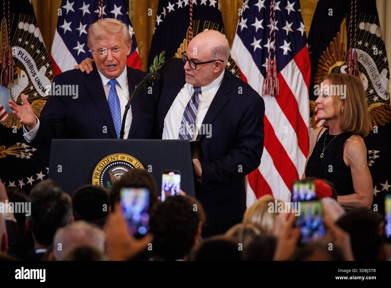 U.S. President Donald Trump brings broadcaster Mark Levin and his wife ...