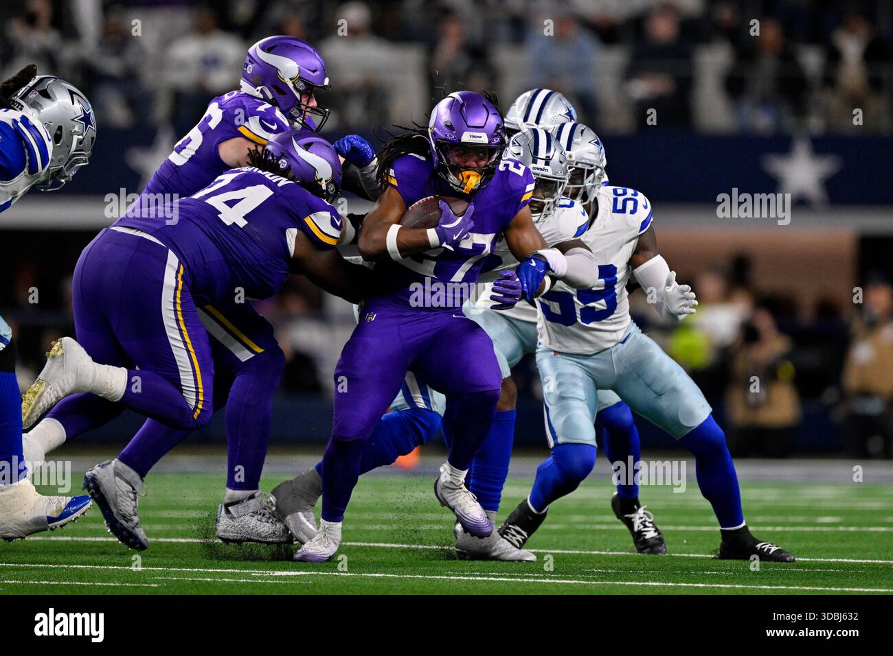 Minnesota Vikings running back Jordan Mason (27) runs with the ball ...