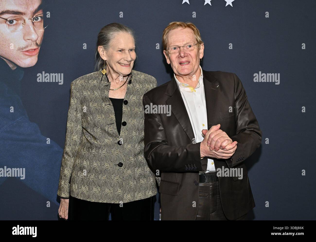 Philippe Petit, right, and guest attend the premiere of "Marty Supreme" at Regal Times Square on ...