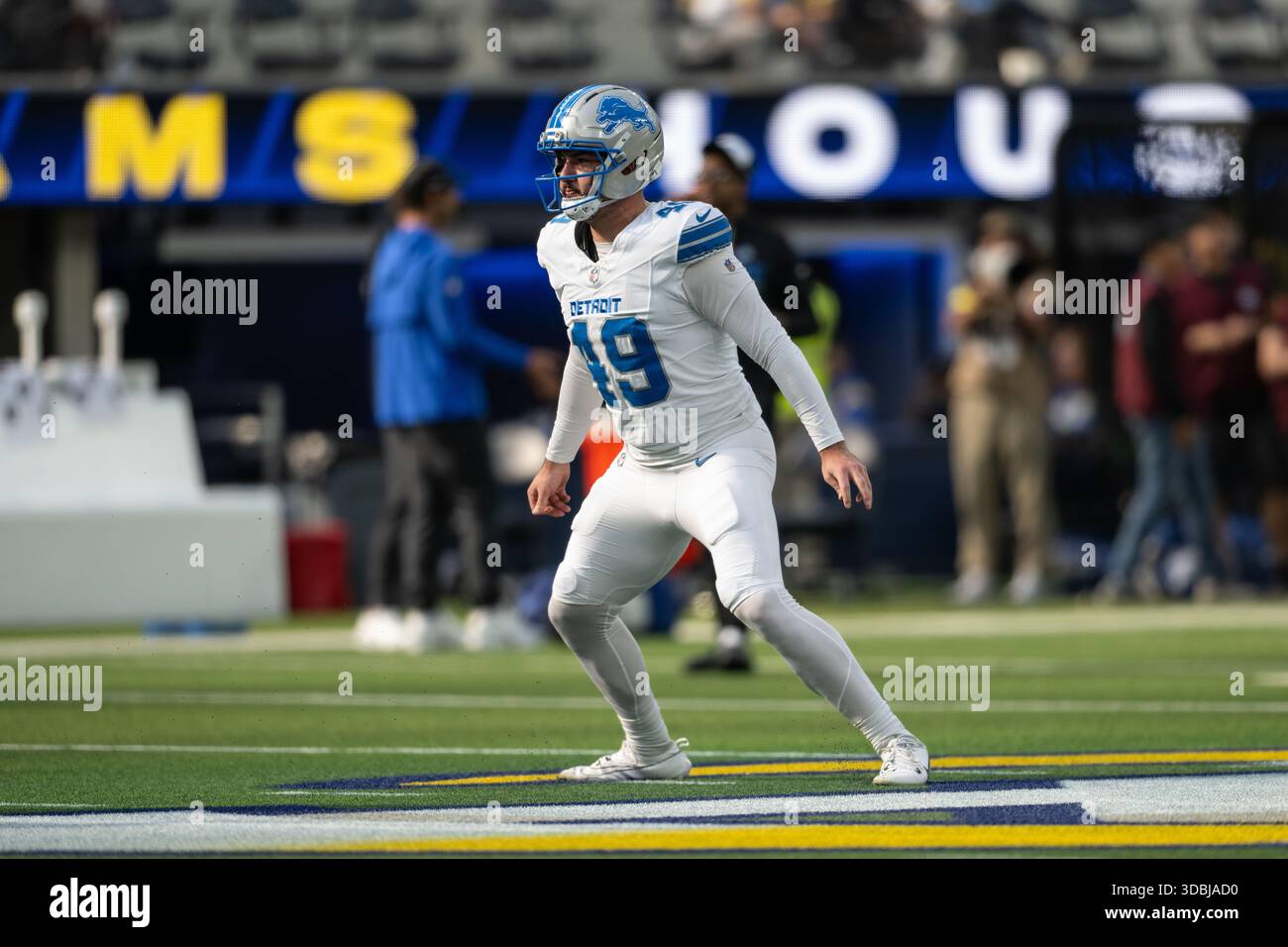 Detroit Lions long snapper Hogan Hatten (49) takes his stance before an ...