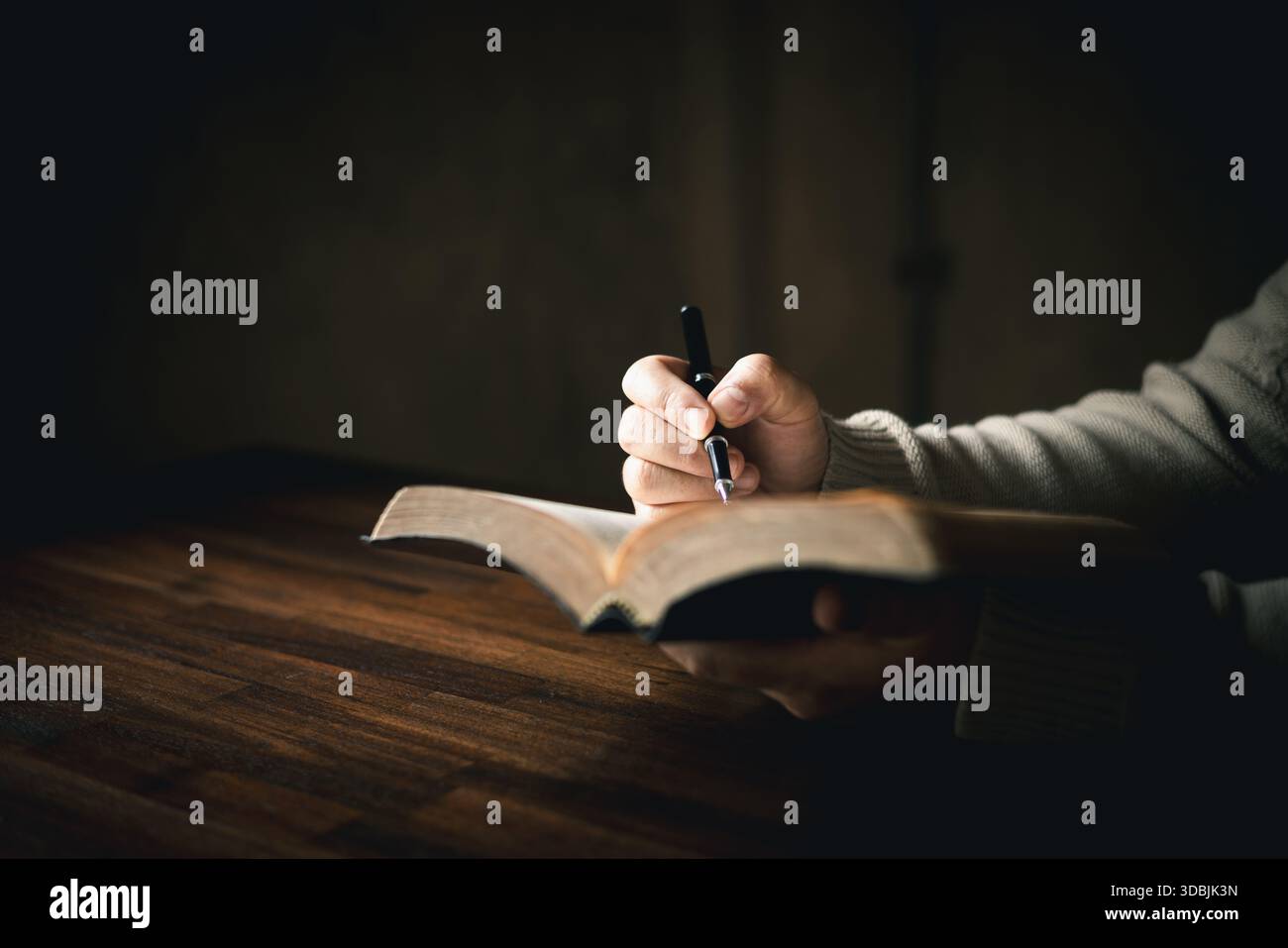 Man with holy bible in his hand, ready to pray, seek guidance from God ...