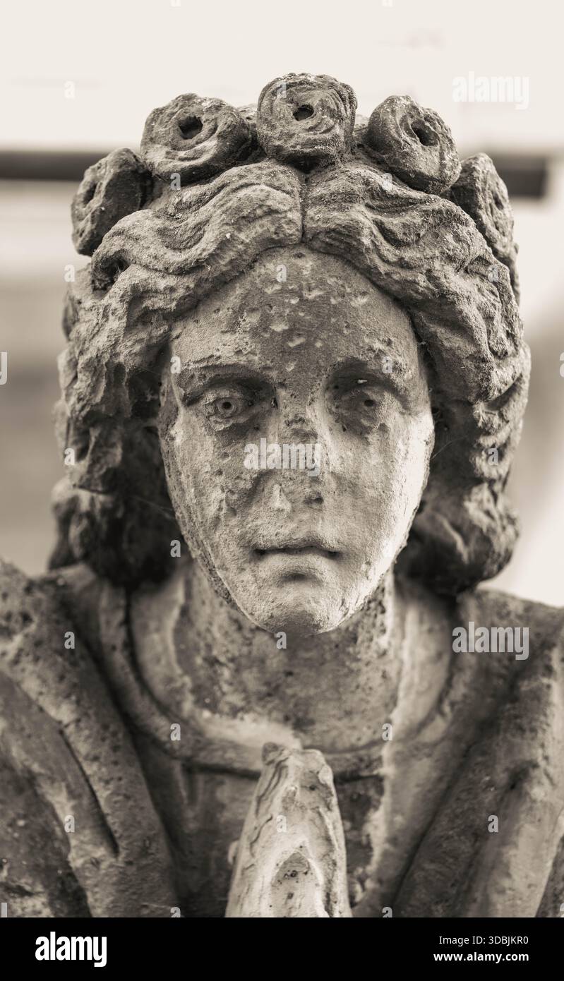 Very Old Statue of an Angelic Face before a Church in Black and White ...