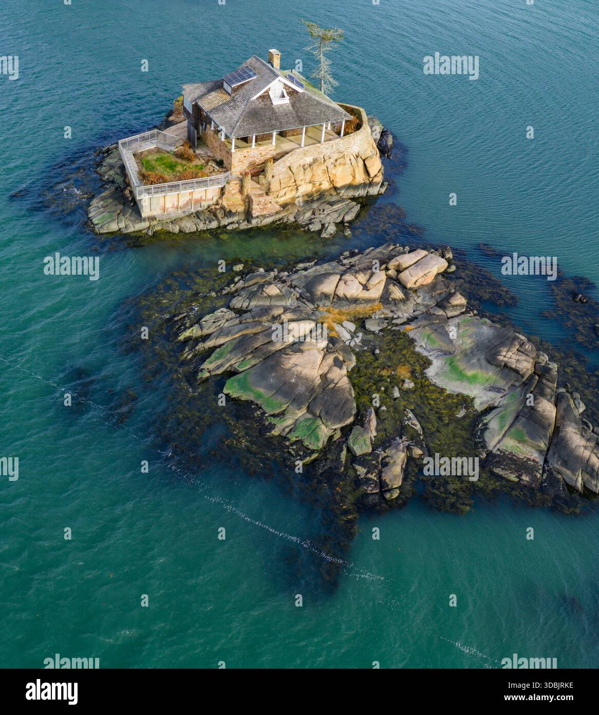 Island home. Solitary island house. Getaway house on rocky island ...