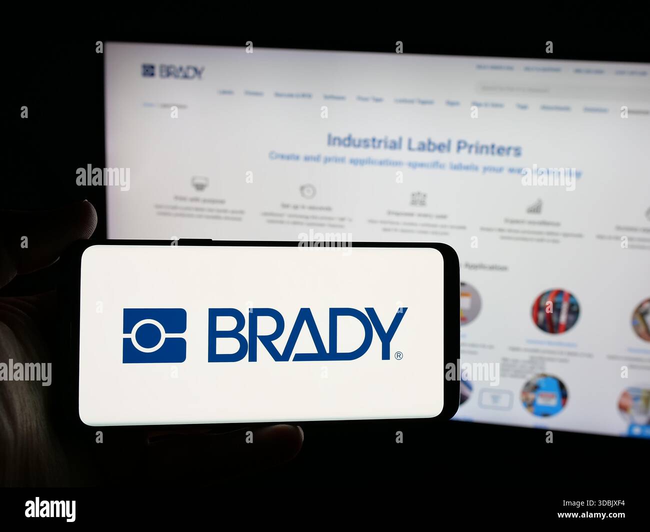 In this photo illustration, a person is holding a smartphone with the ...