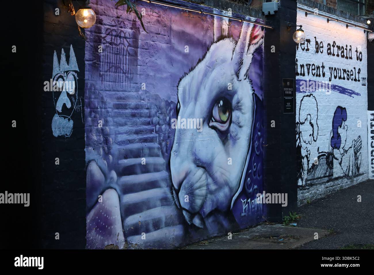 Street art mural in Shoreditch, east London, featuring a white rabbit ...