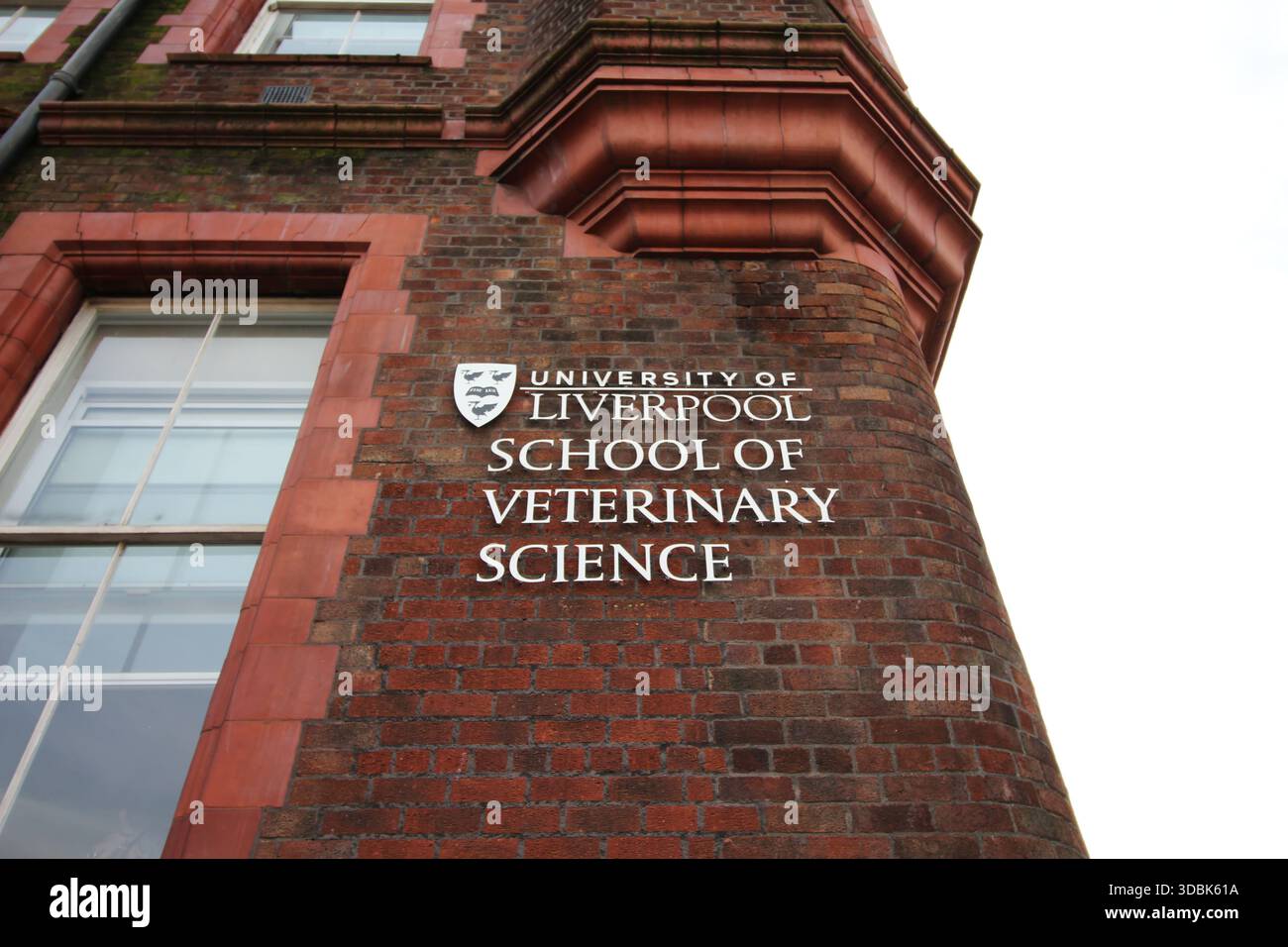 Signage on the red brick exterior of the University of Liverpool School ...