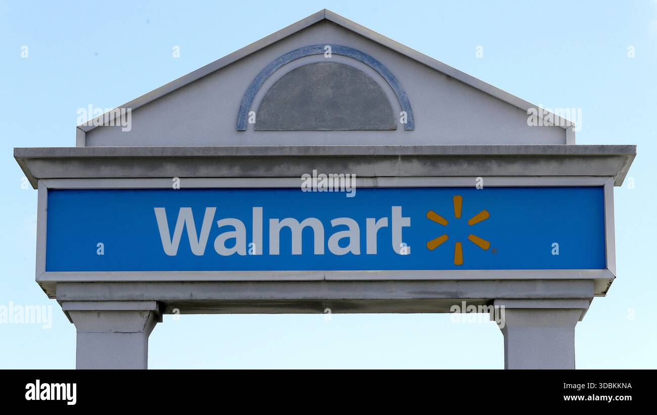 FILE - In this Tuesday, Sept. 3, 2019, file photo, a Walmart logo forms ...