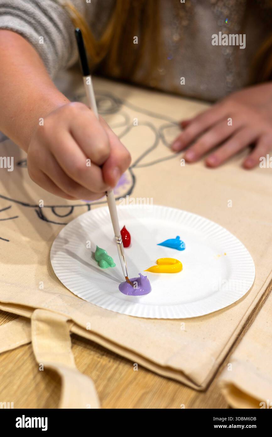 Inclusive art class for children with special needs, close-up of hand ...