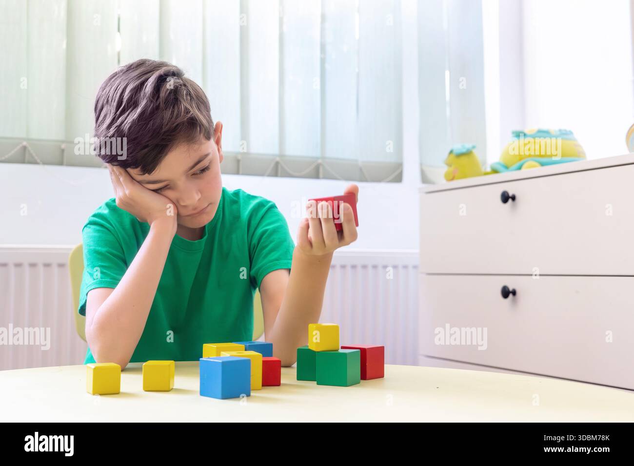 Child Engaging with Colorful Blocks During Therapeutic Session. Child ...