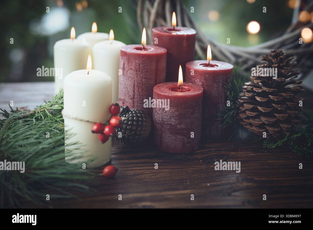 Christmas background with red and white advent candles. Natural ...