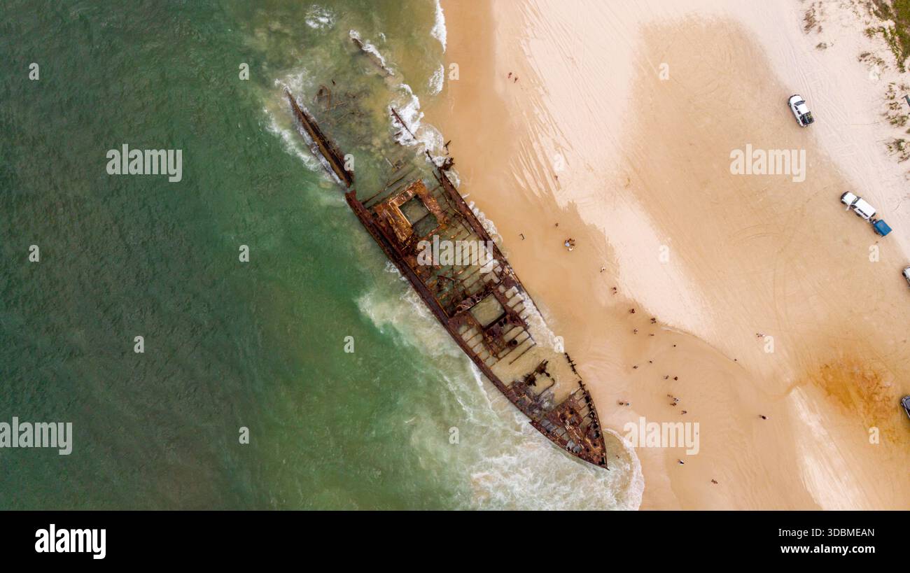Aerial view of the rusted skeleton of the SS Maheno shipwreck stranded ...