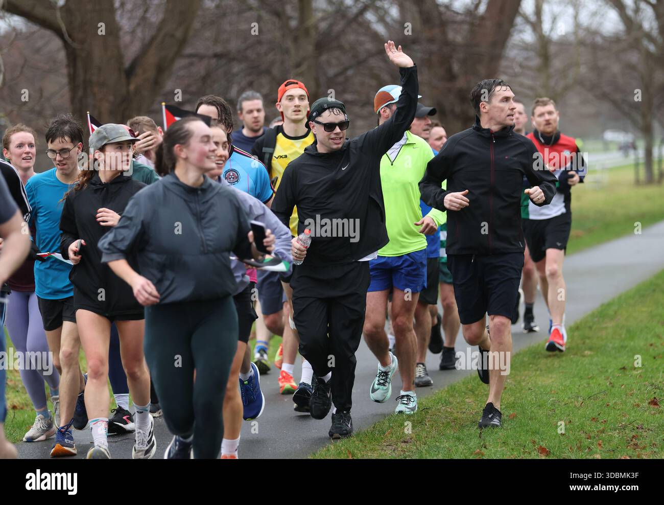 Kneecap member Naoise O Caireallain (Moglai Bap) waves to Irish ...