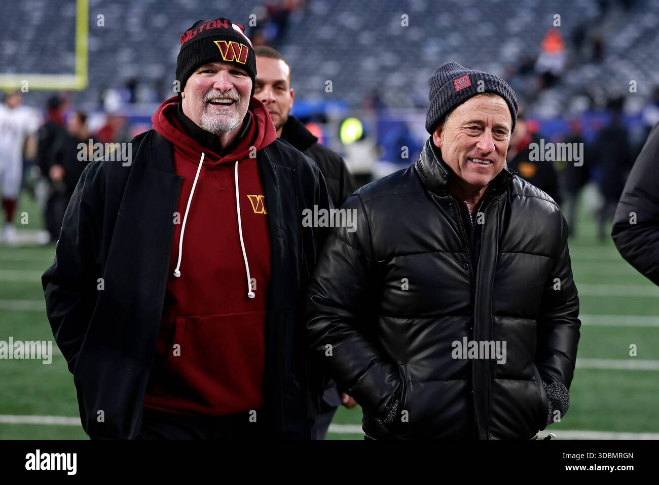 Washington Commanders head coach Dan Quinn and owner Josh Harris walk ...