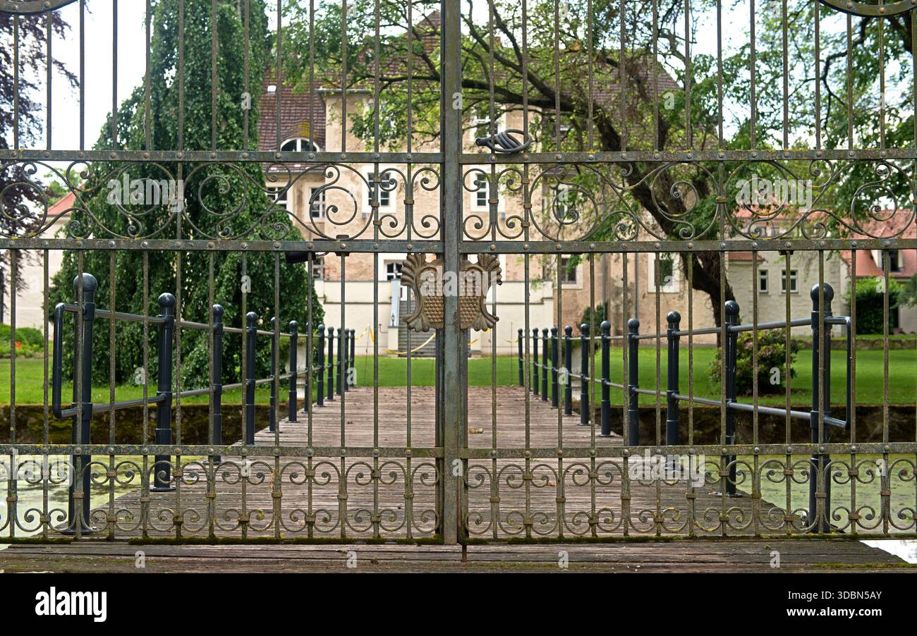 Two winged wrought iron gate at mellenthin moated castle hi-res stock ...