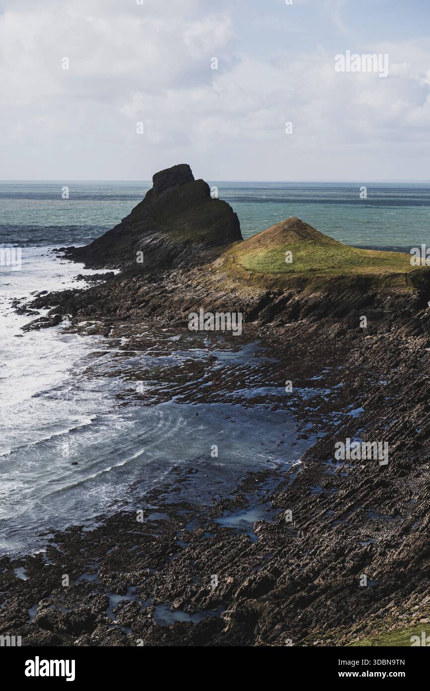 The spectacular coastal path to Worms Head, a huge island in the shape ...