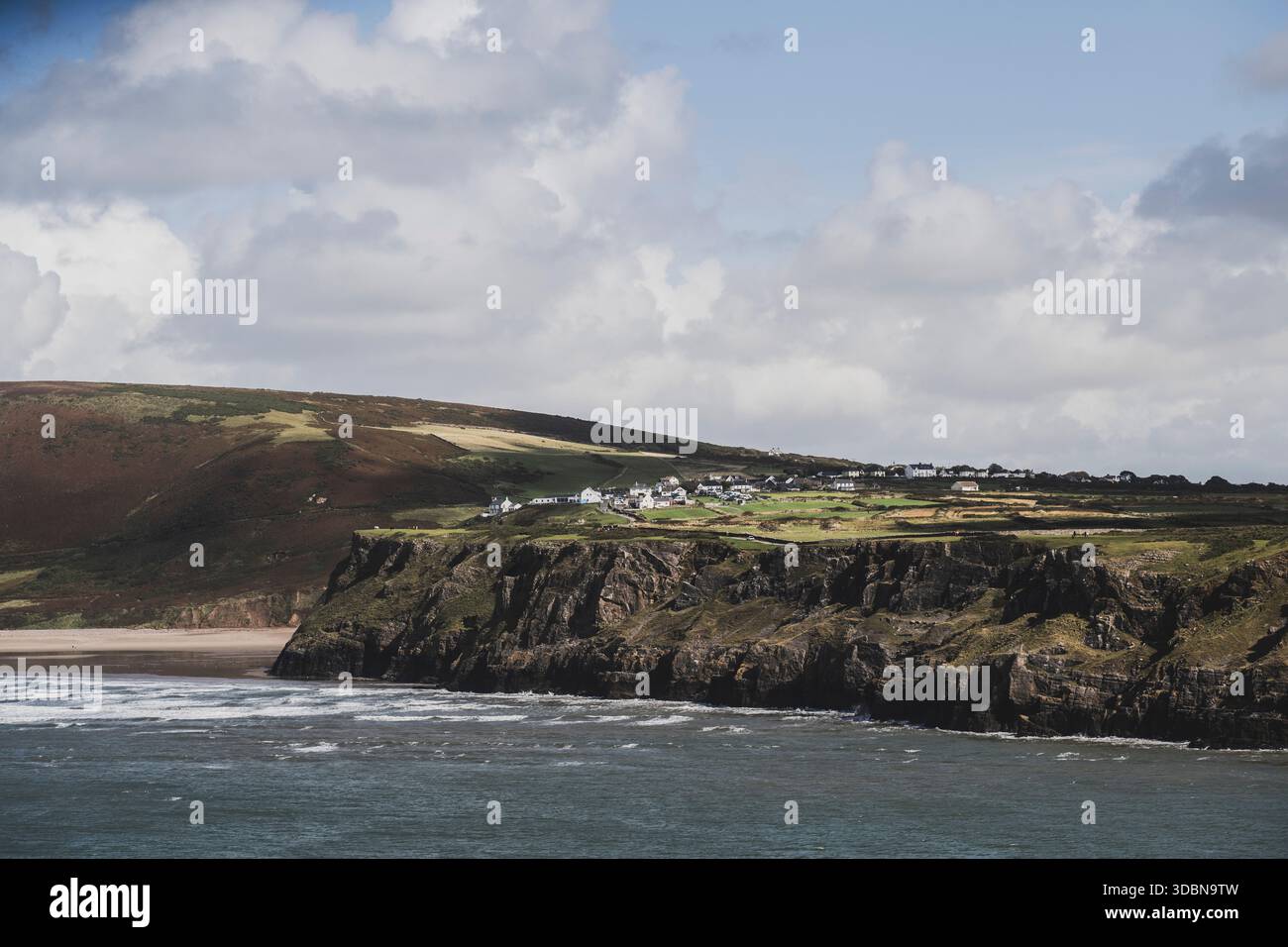 The spectacular coastal path to Worms Head, a huge island in the shape ...