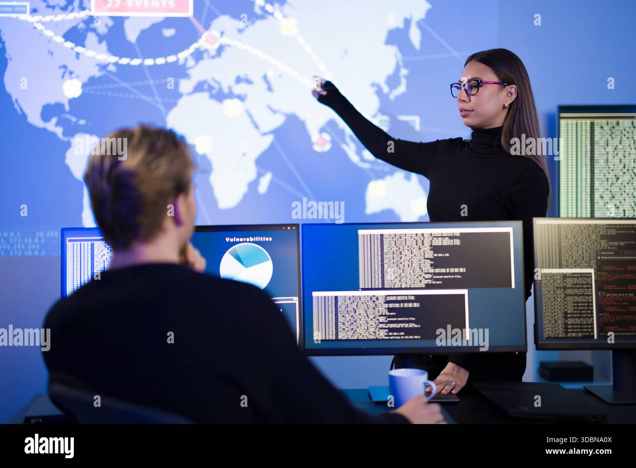 Cybersecurity analyst investigating data hi-res stock photography and ...