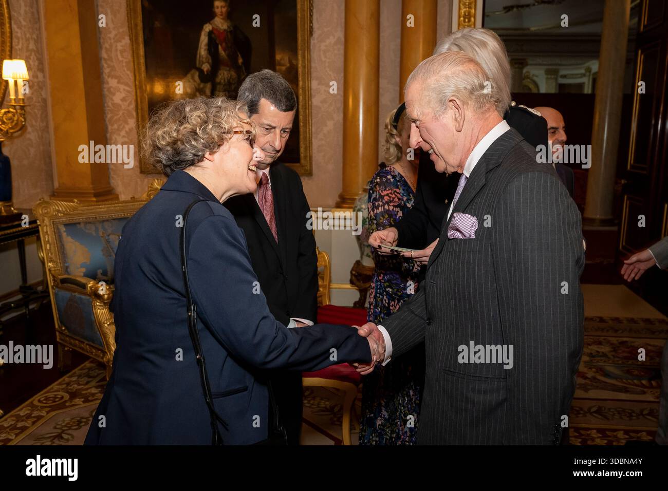 King Charles III (right) greets Kevin Deeley and wife Christie Deeley ...