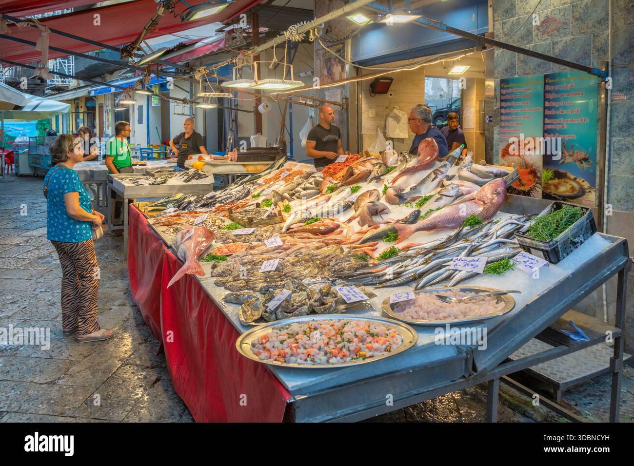 Fresh fish and daily catch on display at an open-air stall in the Capo ...