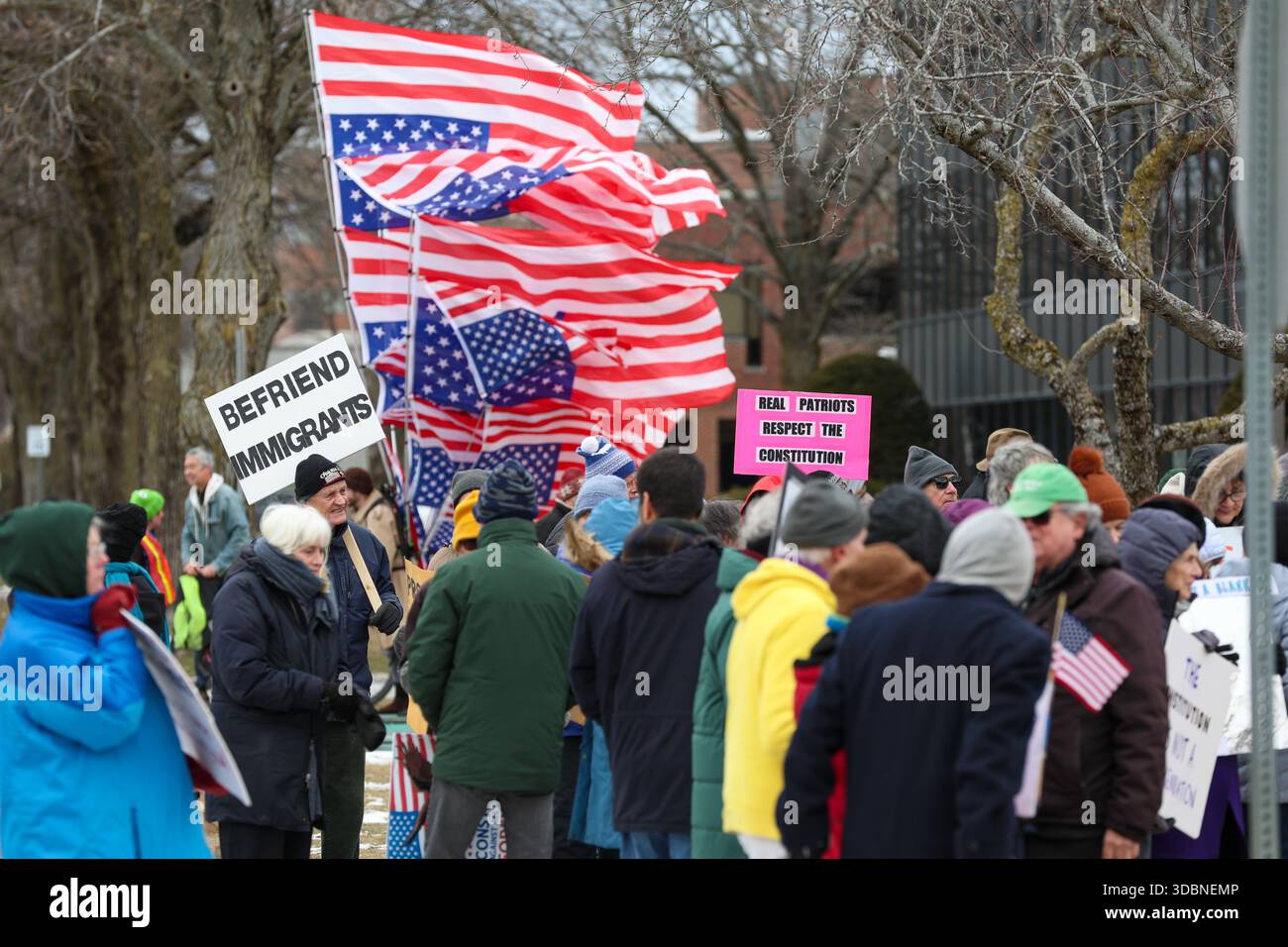 December 17, 2025, Burlington, Massachusetts, USA: Protestors hold ...