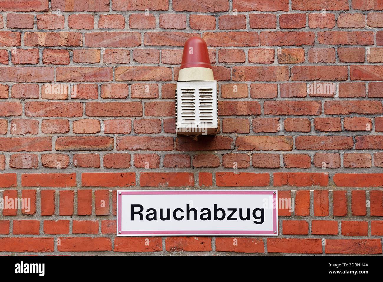 Fire protection sign rauchabzug signal detector on house wall hi-res ...