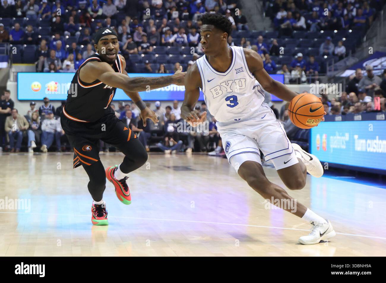 BYU forward AJ Dybantsa (3) drives to the basket as Pacific guard ...