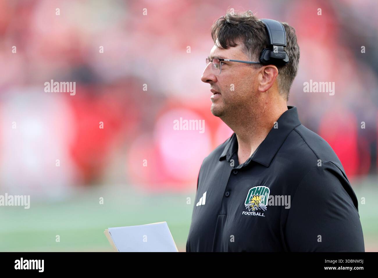 FILE - Ohio's head coach Brian Smith watches during an NCAA football ...