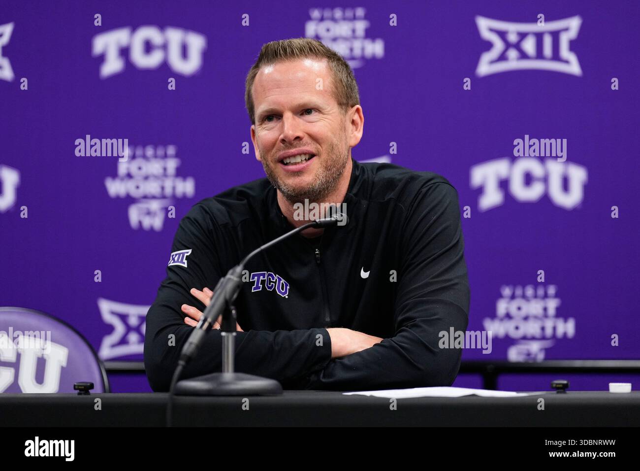 TCU head coach Mark Campbell responds to a question during a news ...