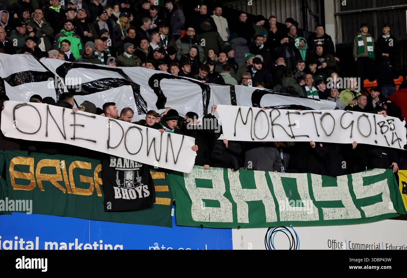 Fans hold up banners during the William Hill Premiership match at the ...