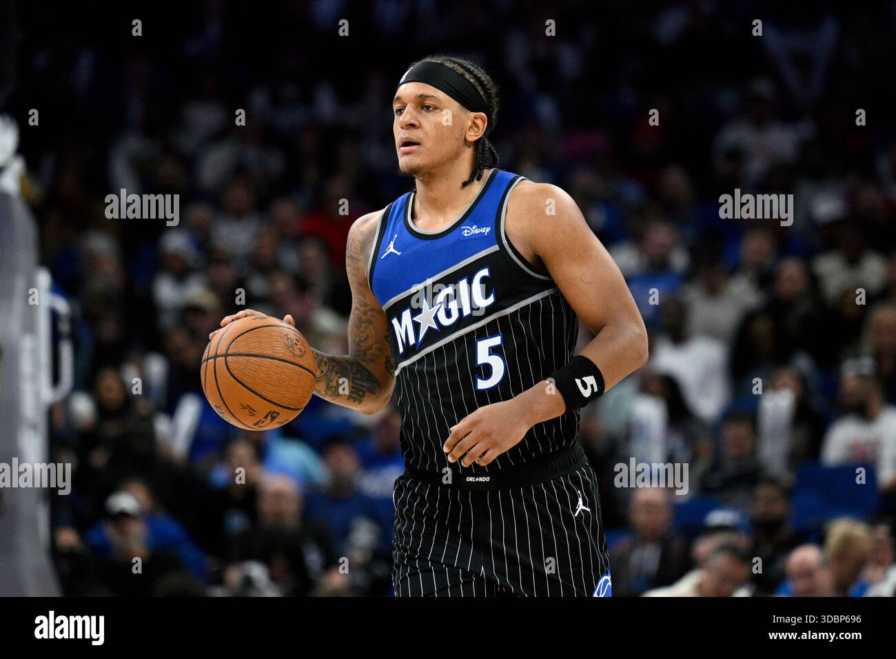 Orlando Magic forward Paolo Banchero (5) brings the ball up the court ...