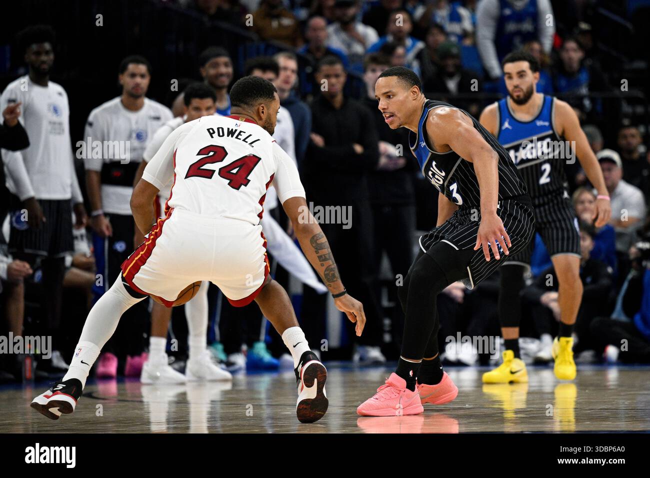 Miami Heat guard Norman Powell (24) is defended by Orlando Magic guard ...