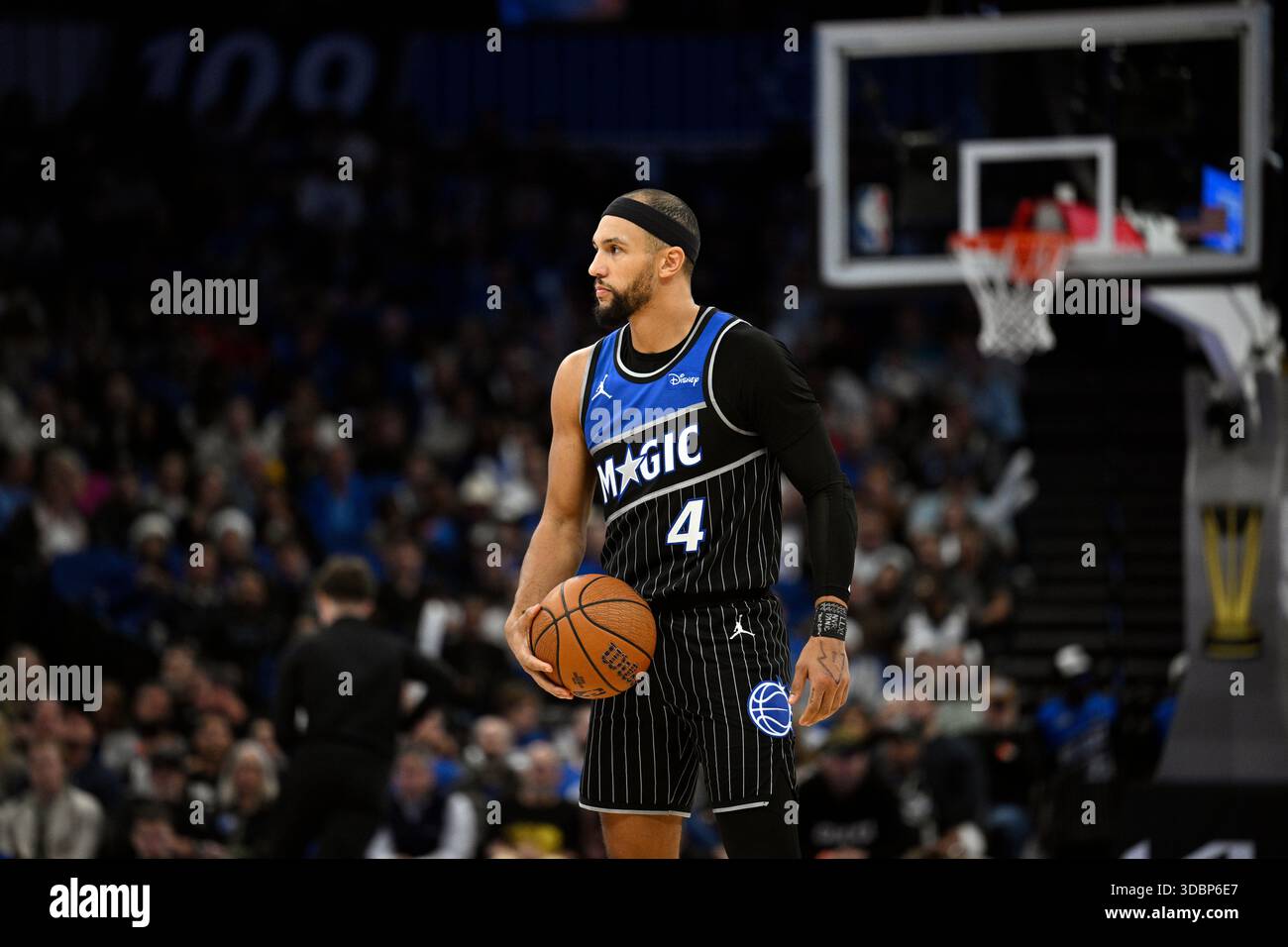 Orlando Magic guard Jalen Suggs (4) controls the ball against the Miami ...