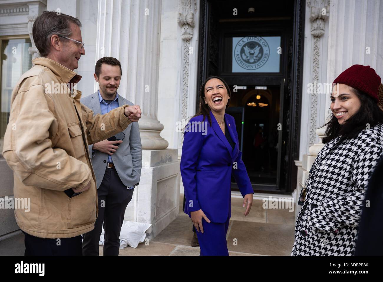 Rep. Tim Burchett (R-Tenn.) offers a fist-bump to Rep. Alexandria ...