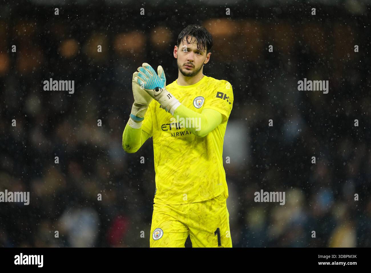 Manchester City's goalkeeper James Trafford applauds fans after the ...