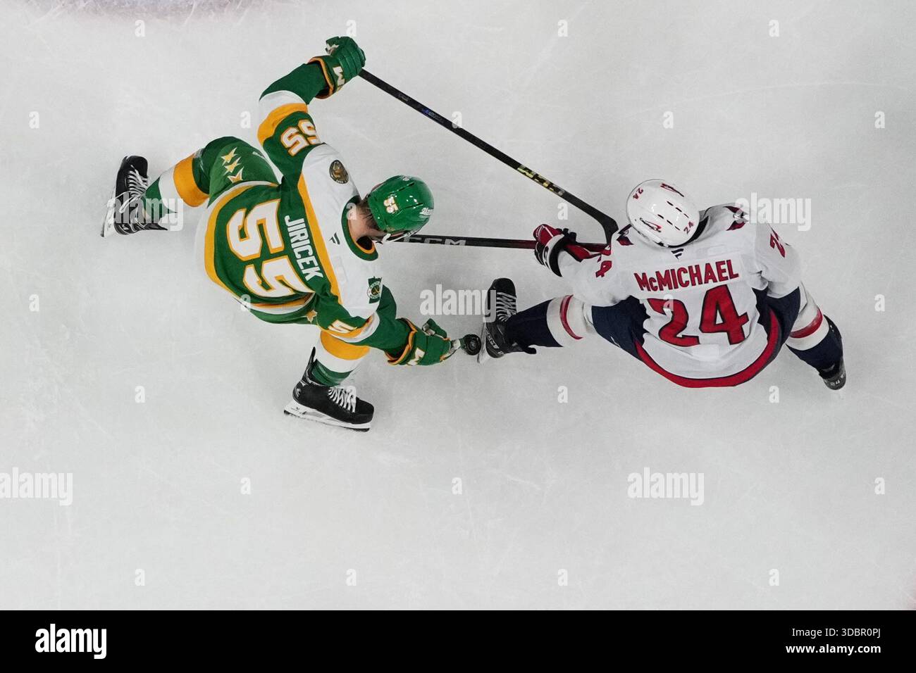 Minnesota Wild defenseman David Jiricek (55) and Washington Capitals center Connor McMichael (24 ...