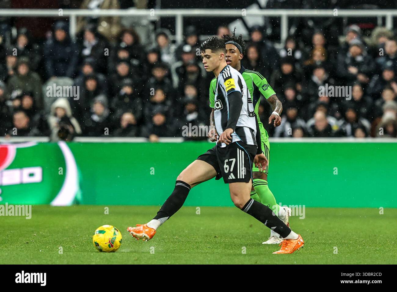 Lewis Miley of Newcastle United passes the ball during the Carabao Cup ...