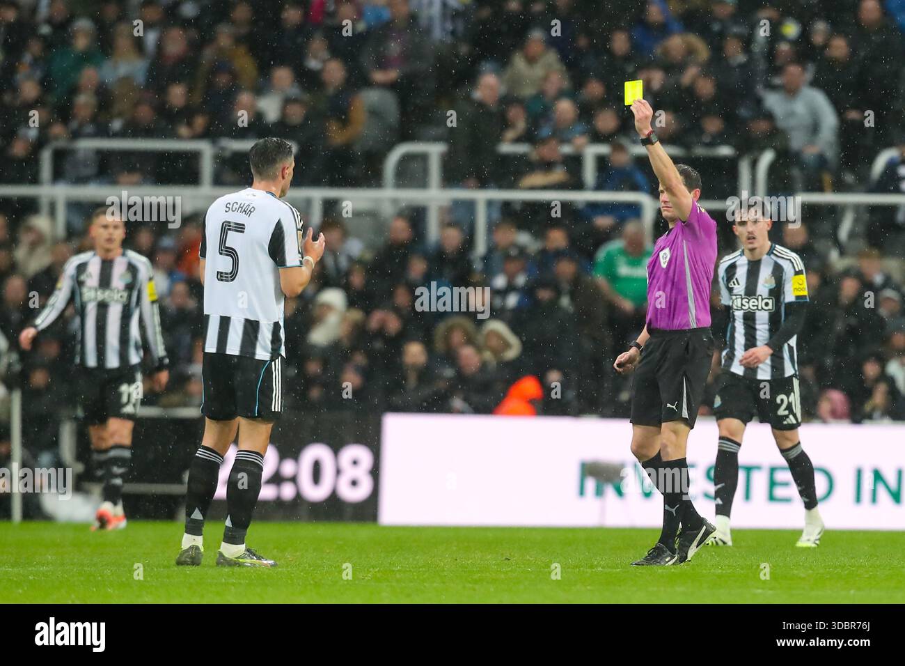 Fabian Schär Of Newcastle United is shown a yellow card by Referee ...