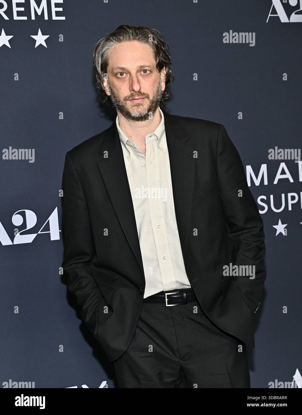 Daniel Lopatin attends the premiere of "Marty Supreme" at Regal Times ...