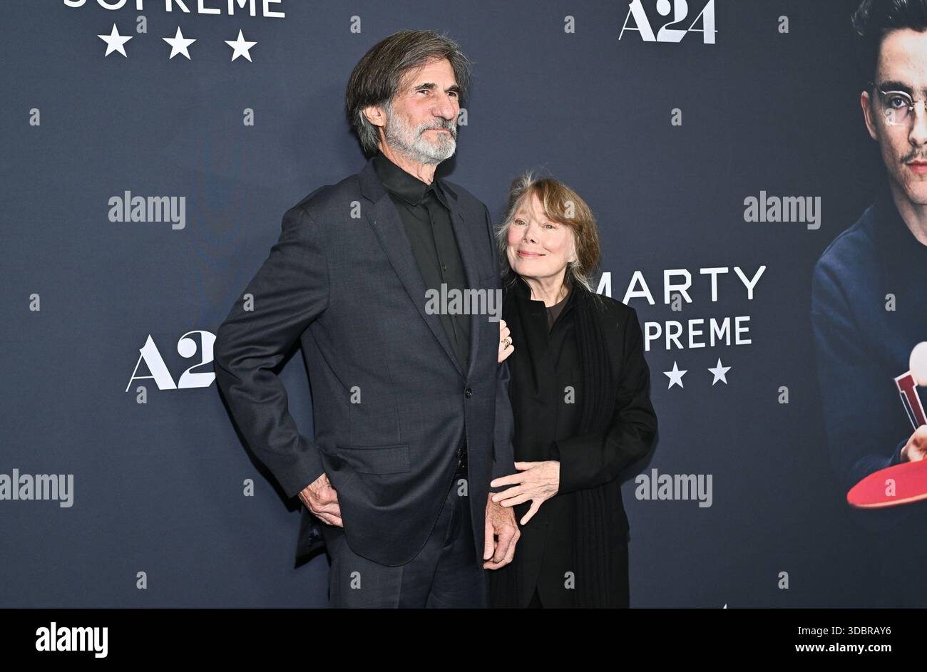 Jack Fisk, left, and Sissy Spacek attend the premiere of "Marty Supreme ...