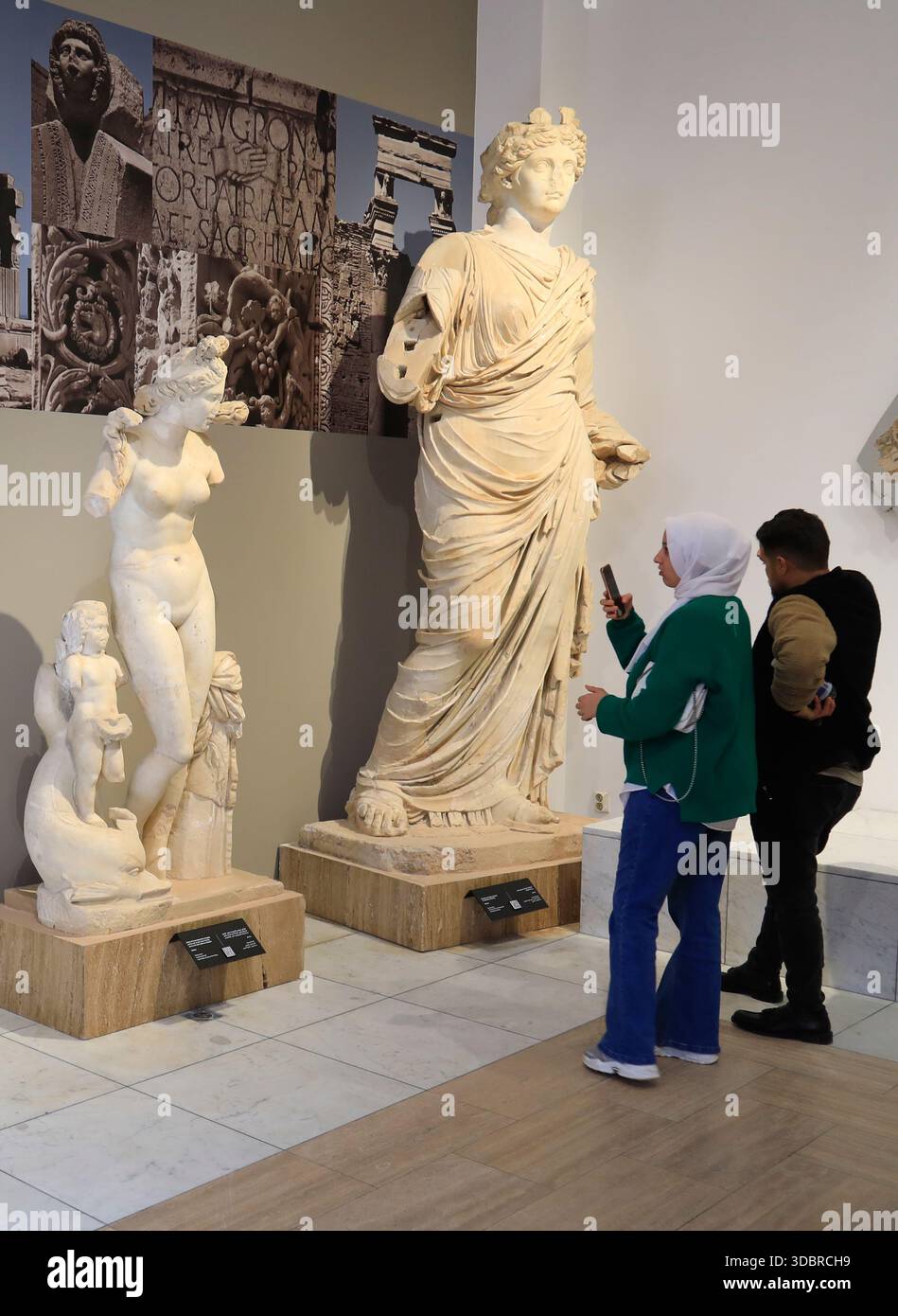 Visitors view Greek artifacts displayed at the National Museum in ...