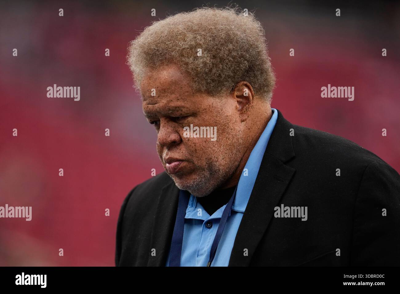 Tennessee Titans vice president/football advisor Reggie McKenzie walks ...