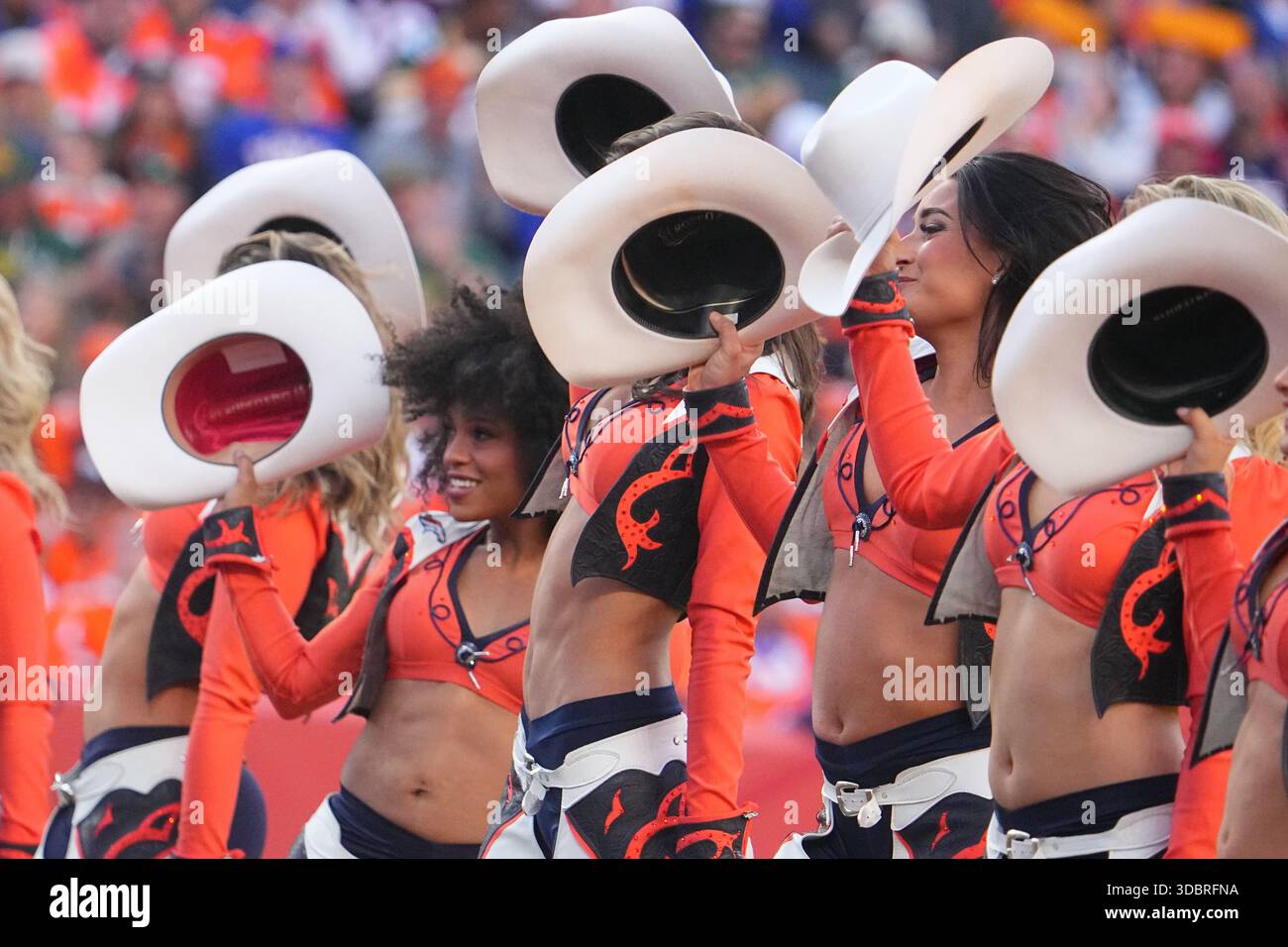 The Denver Bronco Cheerleaders perform during the Denver Broncos ...